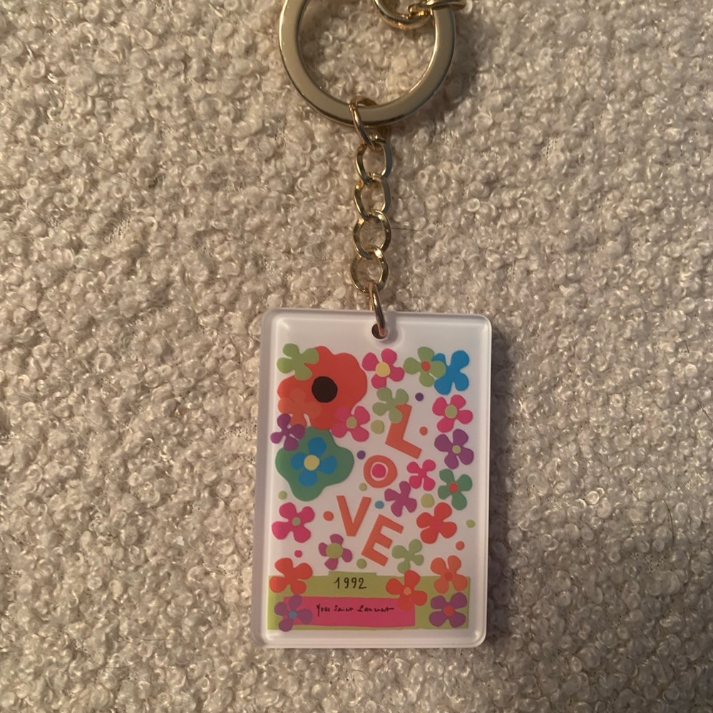 Yves Saint Laurent White And Gold Logo Keychain - Gem